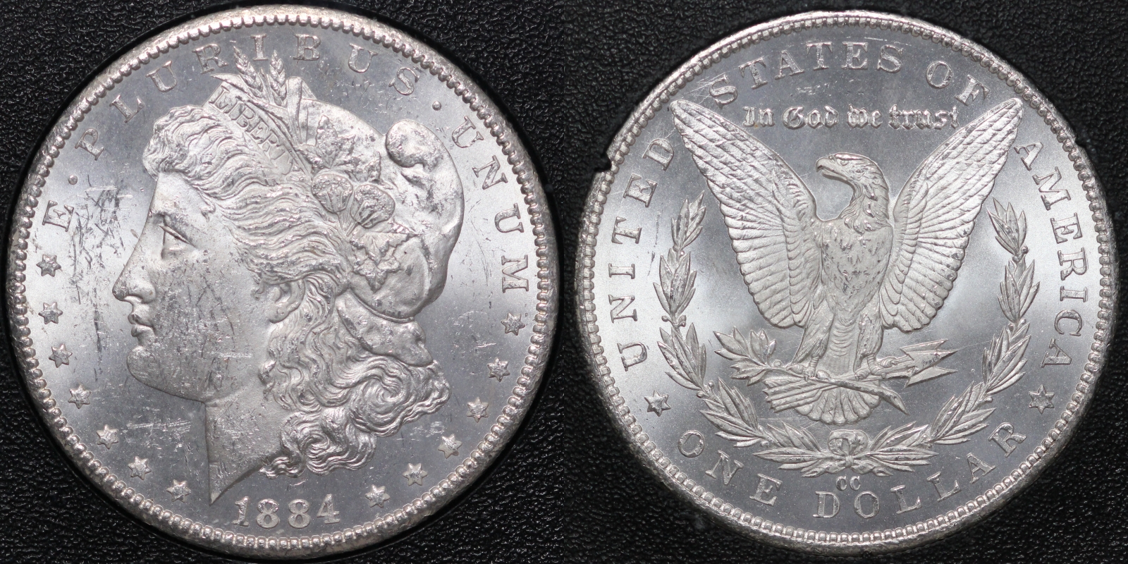 United States 1884-CC GSA Morgan Dollar $1 Uncirculated Silver Coin w ...
